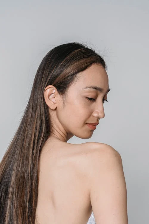 Back Acne: What Is It, Types, Causes, Treatments & Prevention